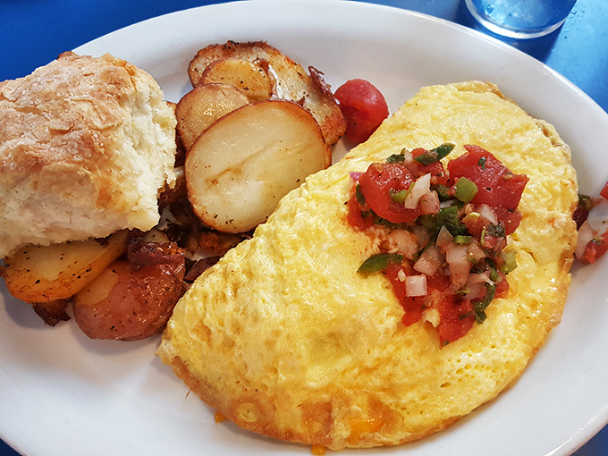 An omelet so perfectly executed it could give a TED talk on the art of breakfast. That pico de gallo adds a wake-up call no alarm clock could match.
