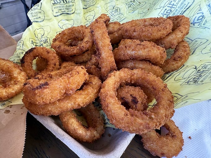 Golden rings of crispy perfection that could make even the most devoted fry-lover reconsider their allegiances completely.