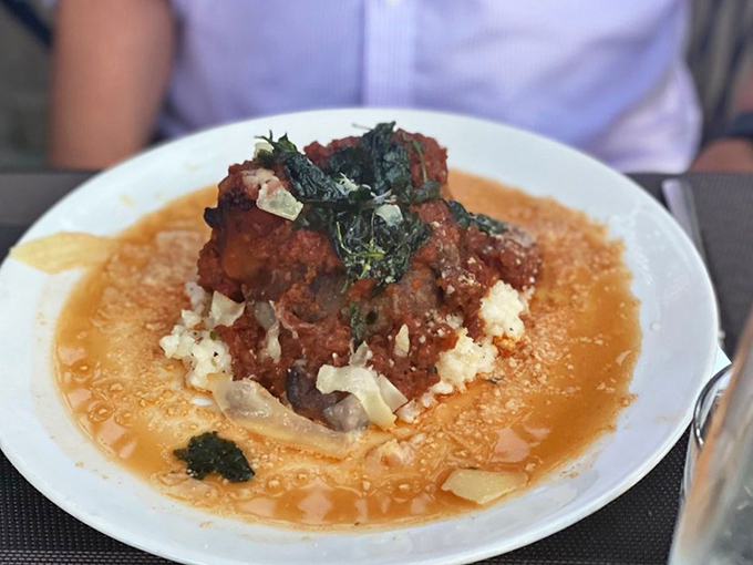 Osso buco that doesn't just fall off the bone&mdash;it practically leaps onto your fork, begging to be savored atop that golden pool of risotto.