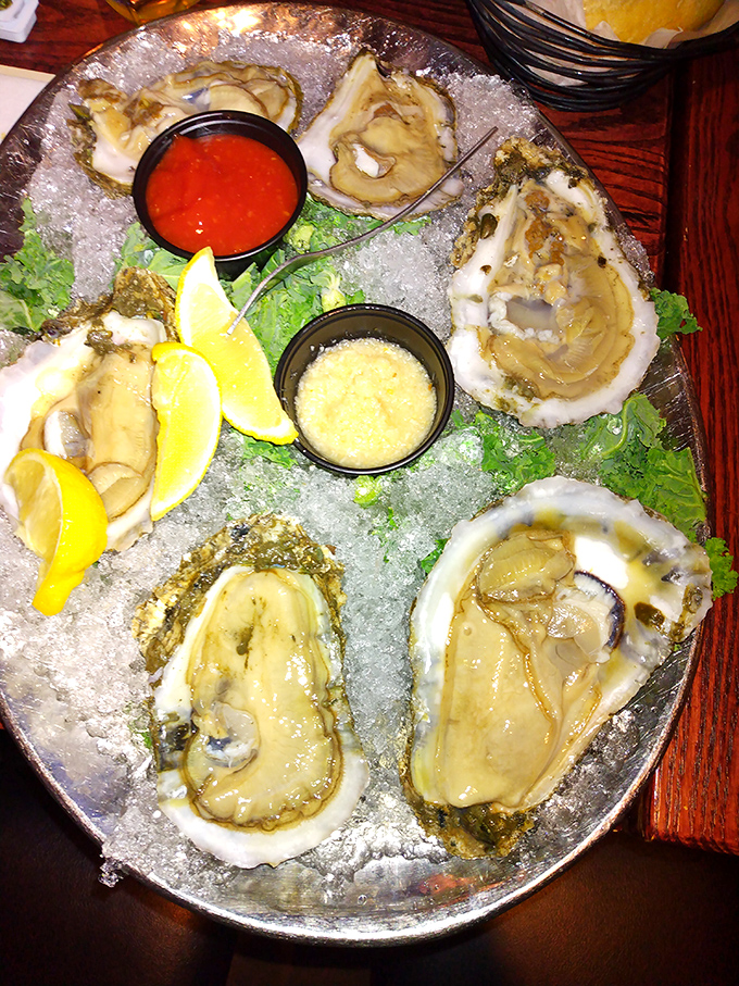 Fresh oysters on ice, glistening like jewels from the Chesapeake, waiting to deliver that perfect briny kiss of the sea.