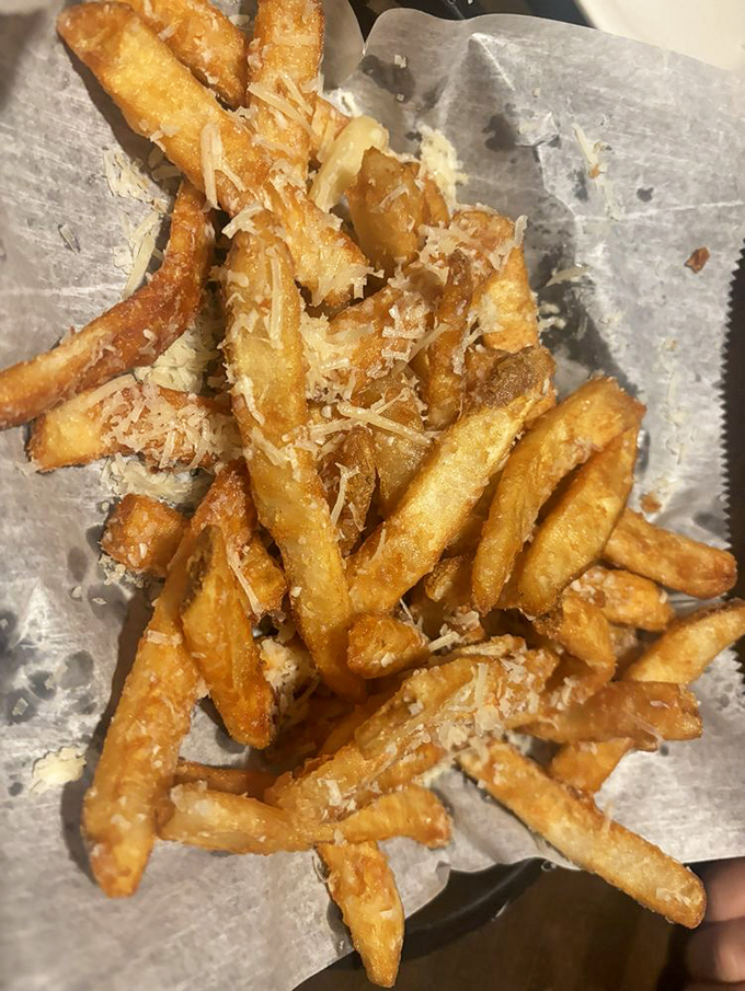 Parmesan fries that elevate the humble potato to art form status &ndash; crispy, cheesy, and impossible to stop eating.