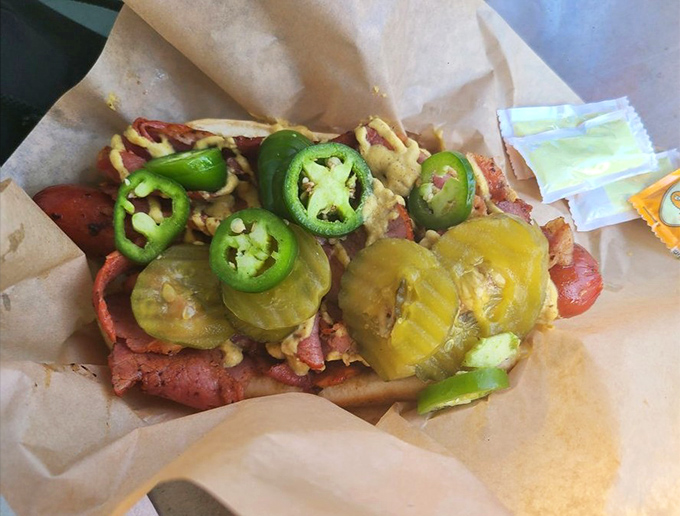 The pastrami hot dog &ndash; where East Coast deli tradition meets West Coast beach vibes in a handheld masterpiece topped with jalape&ntilde;os.
