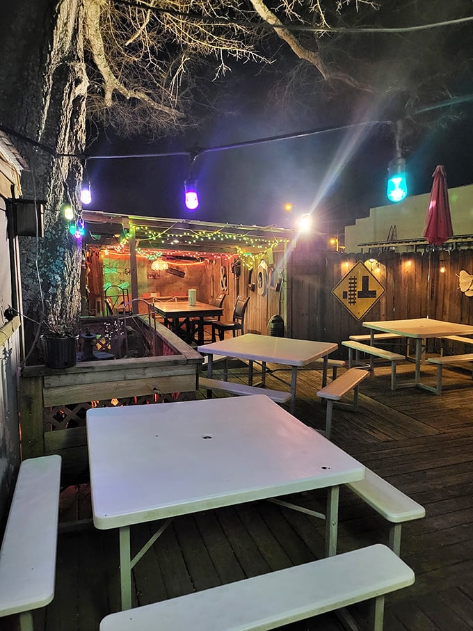 String lights and picnic tables create a communal gathering space where strangers become friends between double features.