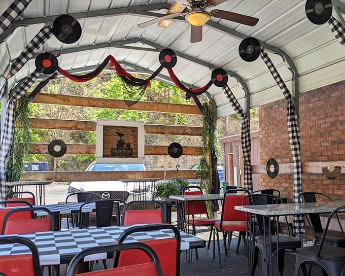Vintage records and checkered charm make this covered patio the perfect spot for people-watching between bites.