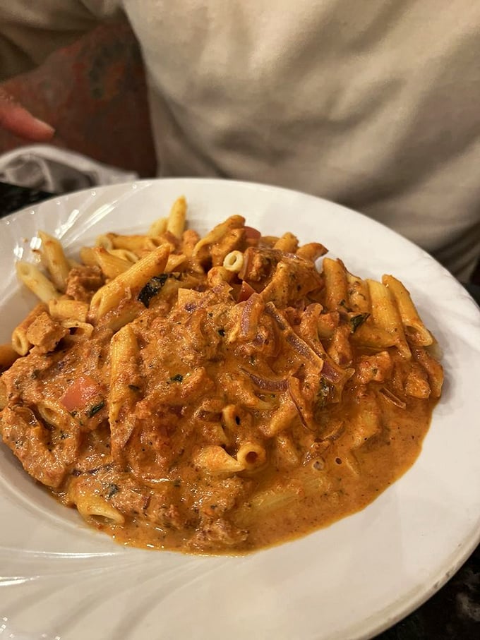 This penne alla vodka doesn't just sit on the plate&mdash;it performs. The creamy tomato sauce clings to each pasta tube like it's afraid of being left behind.