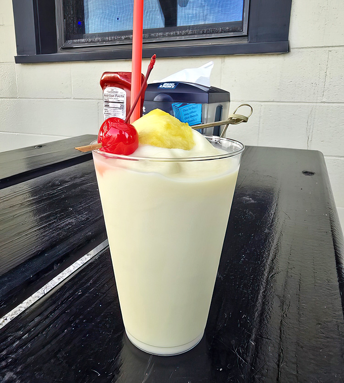 A frosty pi&ntilde;a colada topped with the traditional cherry and pineapple&mdash;because sometimes seafood demands a tropical companion.