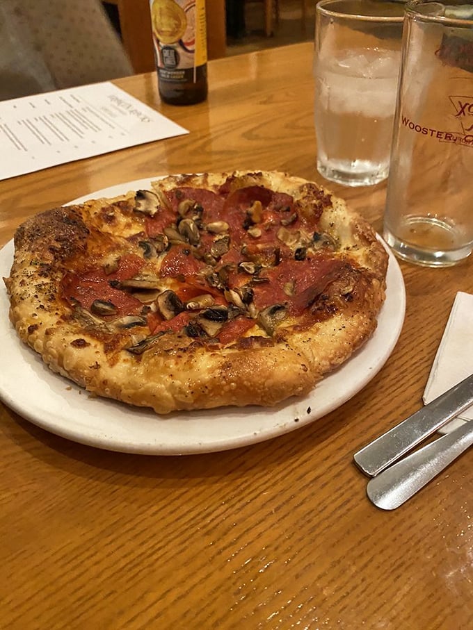 Pizza perfection in personal form—that crust has the kind of character development most Netflix shows wish they could achieve.