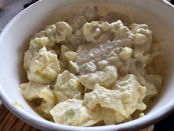 Potato salad that strikes the perfect balance between creamy and chunky &ndash; the Switzerland of side dishes in this meaty United Nations.