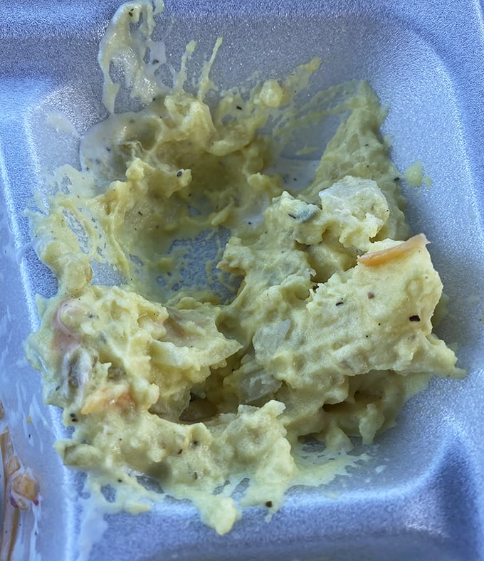 Potato salad that looks suspiciously like the one your aunt claims is "world-famous"&mdash;creamy, chunky, and definitely not from a plastic deli container.