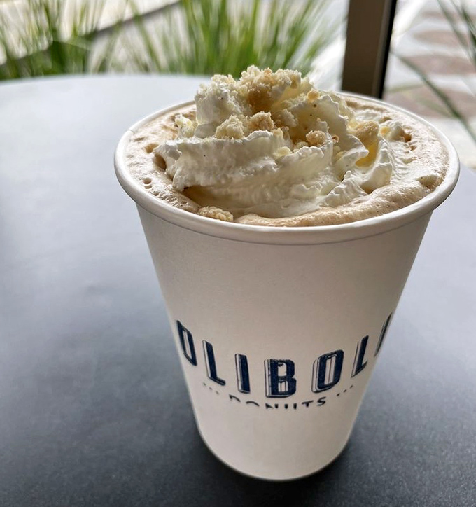 This isn't just coffee – it's a cloud-topped dream with cookie crumbles that makes your regular morning cup look like it's not even trying.