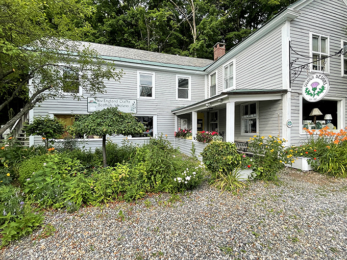 Quaigh Designs emerges from its garden like a storybook cottage. The flowers aren't just decorations; they're a warm Vermont welcome.