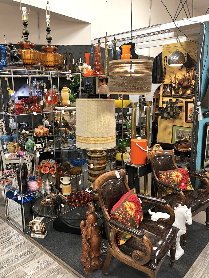 Lamps that could tell stories if they could talk. That leather chair has definitely hosted important conversations and possibly a cigar or two.