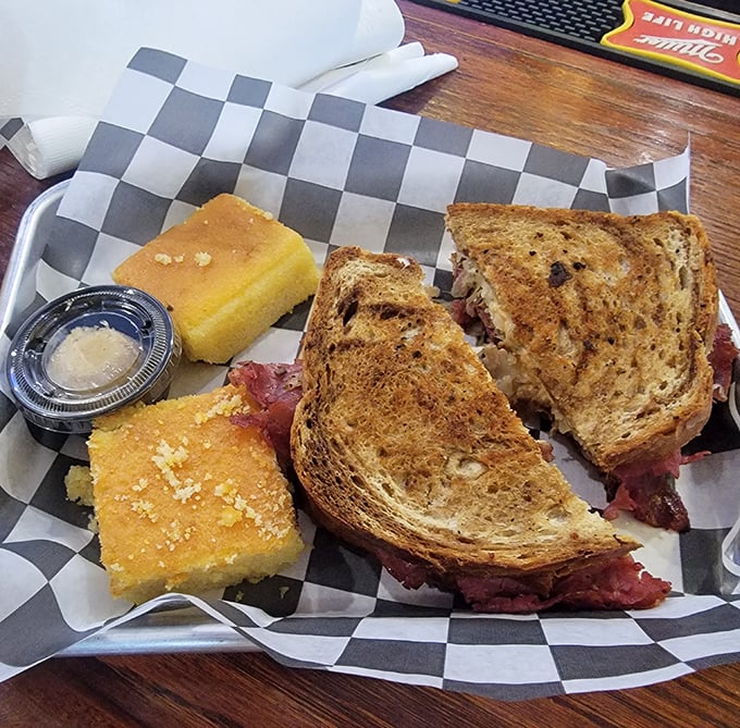 The Reuben sandwich: where corned beef meets grilled rye in a relationship so perfect it should have its own reality show.