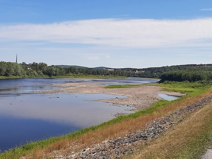 The St. John River flows lazily past Fort Kent's shores, a liquid boundary between nations that locals cross as easily as stepping over a garden hose.