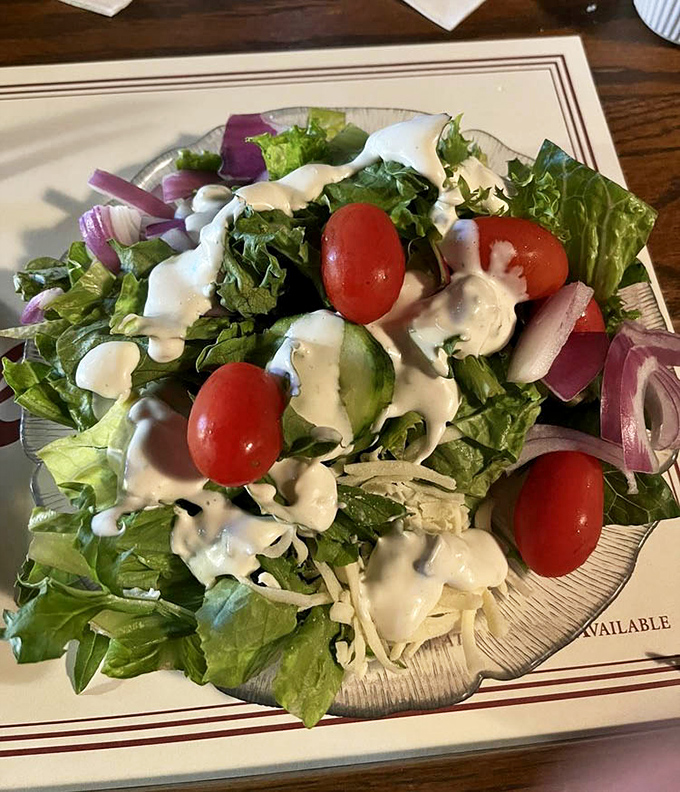 Even the salad gets the royal treatment here. Those tomatoes look like they were picked this morning by someone who really cares.