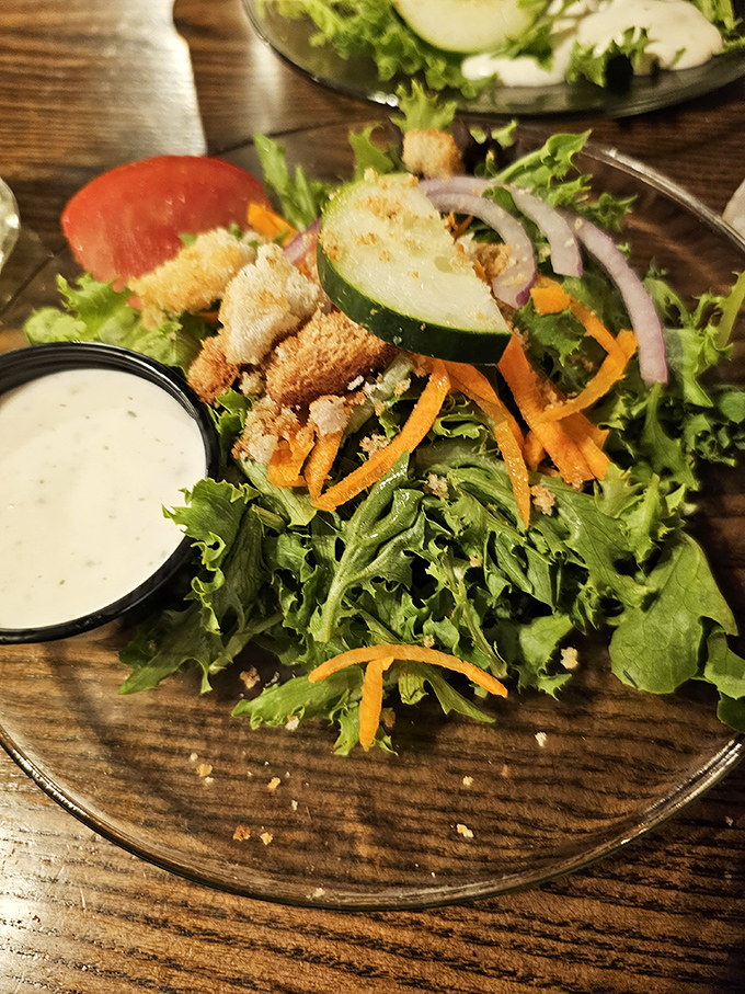 A house salad that doesn't apologize for being a salad. The ranch dressing is practically a food group in the Midwest.