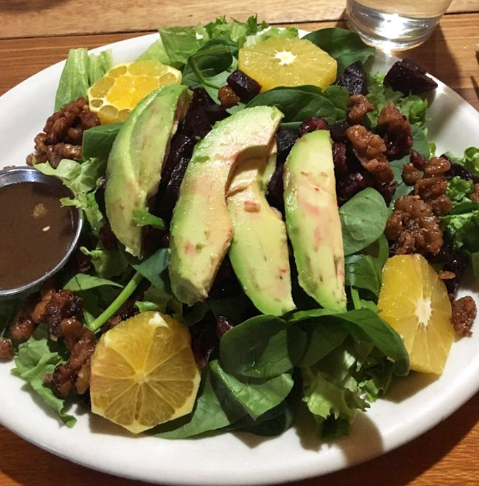 A salad that proves healthy eating needn't be punishment&mdash;avocado, citrus, and candied nuts creating a symphony of textures and flavors.