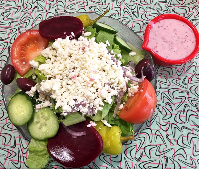 The Greek salad offers a Mediterranean vacation for your palate, with feta crumbles generous enough to make Zeus proud.