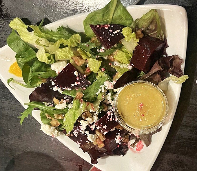 Even the salads here tell a story, with roasted beets and goat cheese creating a colorful canvas of flavors.