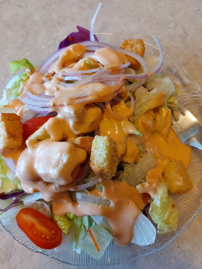 This isn't just a salad—it's a crunchy, creamy carnival of textures and flavors. The thousand island dressing ties everything together like a culinary conductor.