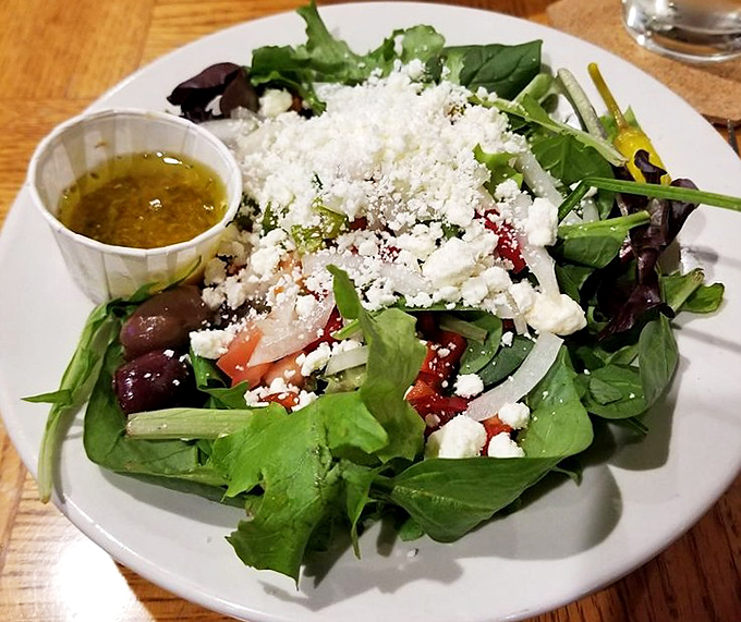 A Greek salad that brings Mediterranean sunshine to Ohio, with feta crumbles so generous they're practically showing off.