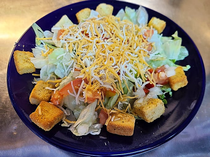Even the salads come loaded with croutons and cheese, because vegetables need proper encouragement to qualify as lunch.
