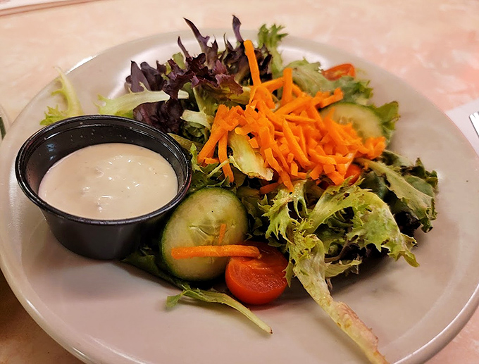Even the salads at Tilt'n Diner have personality. Fresh, colorful, and substantial enough that ordering one doesn't feel like punishment.
