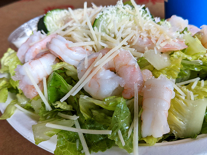 Crisp lettuce topped with plump shrimp and cheese, proving seafood salads can be both virtuous and completely satisfying at once.