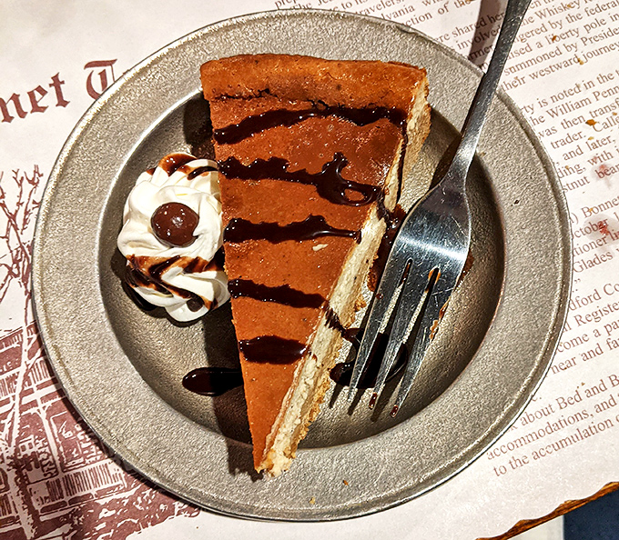 Dessert that makes you consider ordering a second slice before finishing the first. Chocolate cheesecake with caramel drizzle that deserves its own fan club.