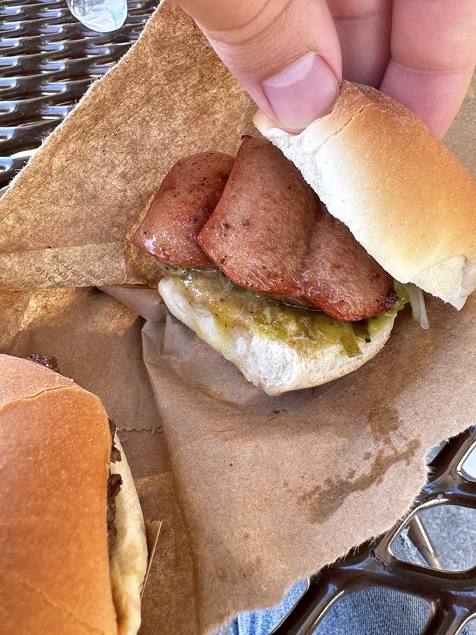 This isn't just a sandwich&mdash;it's architectural genius. The way that relish cascades over the sausage should be studied in culinary school.