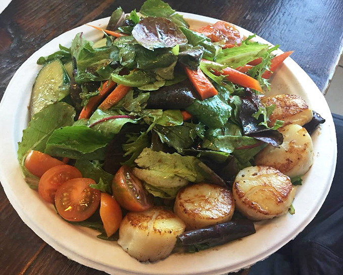 This scallop salad transforms "eating your greens" from obligation to privilege, with perfectly seared treasures from the deep nestled among fresh vegetables.