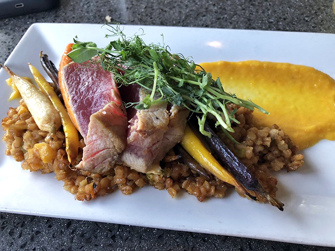 This sea salt seared tuna doesn't just sit on the plate&mdash;it performs, with colorful vegetables and grains creating a stage worthy of its star power.
