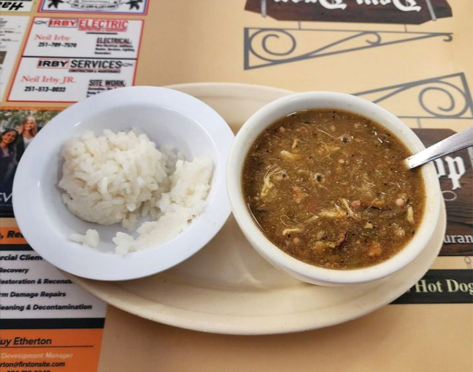 Gumbo served with white rice represents Mobile's Gulf Coast heritage in a bowl that warms you from the inside out.