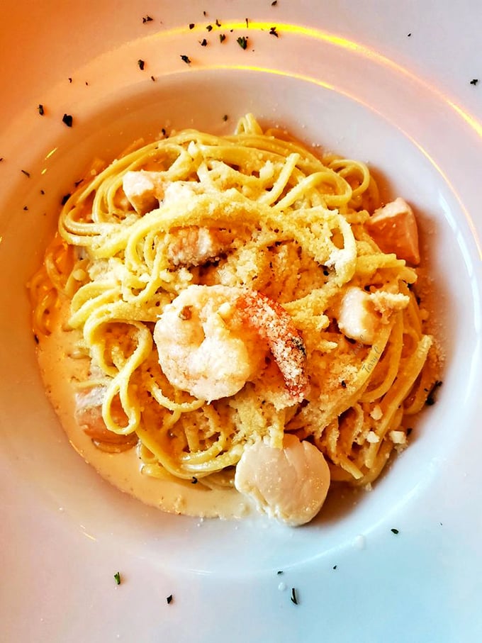 Seafood pasta that whispers sweet nothings to your taste buds – comfort food goes coastal here.