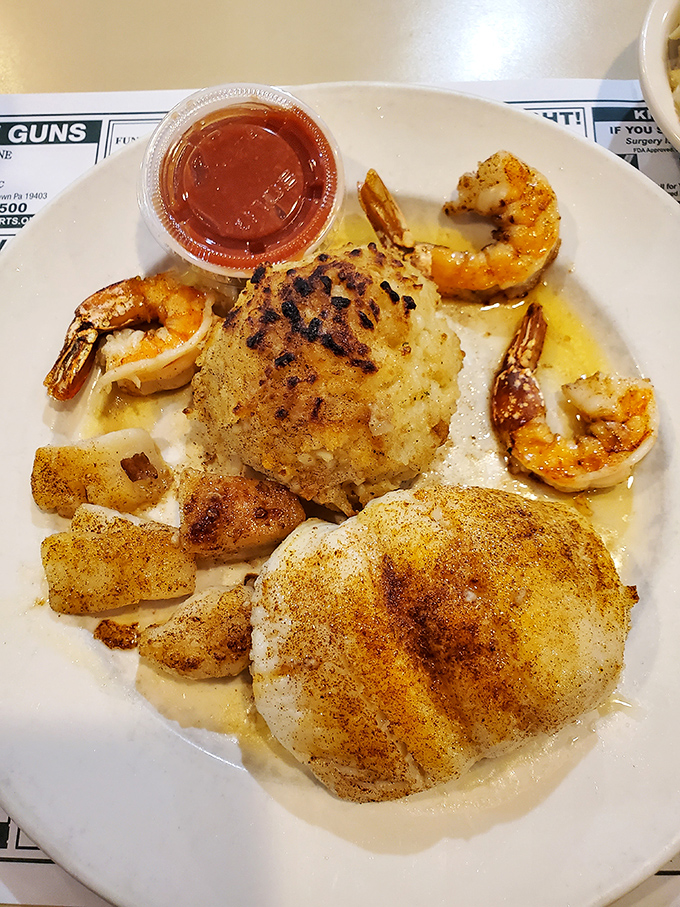 Seafood in Pennsylvania? This golden-crusted crab cake and seasoned shrimp prove that delicious maritime treasures can be found far from any coast.