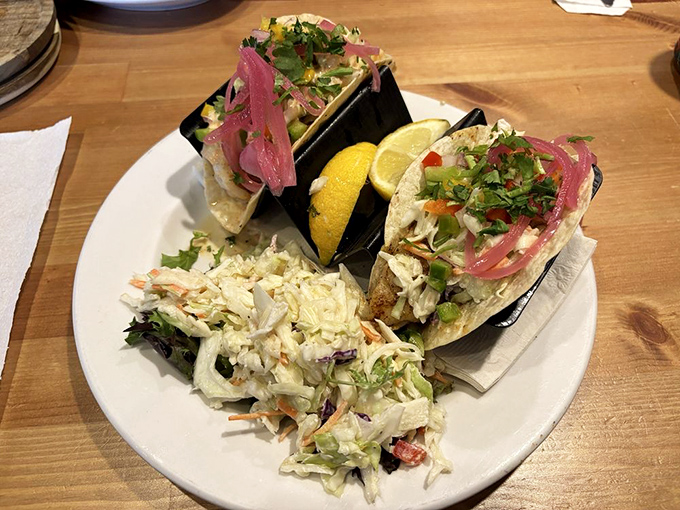 These fish tacos aren't just a meal&mdash;they're edible postcards from paradise, complete with crisp slaw and a squeeze of sunshine.