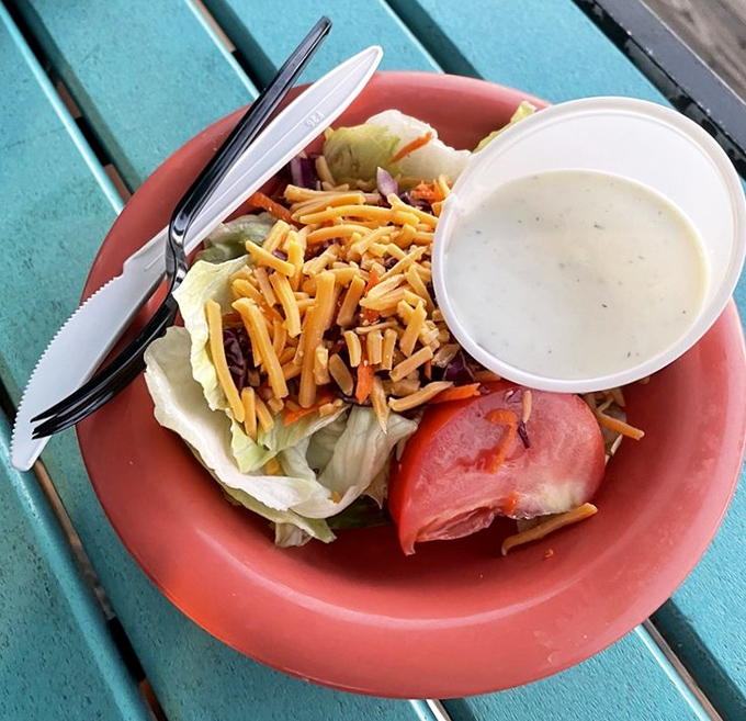 A refreshing side salad that says, "Yes, I'm being healthy" while you contemplate which fried seafood to order next.