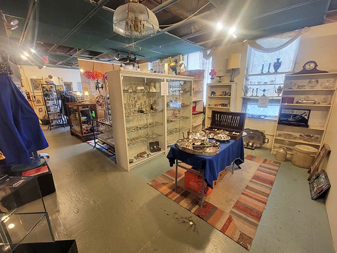 A room where silver serving pieces and crystal decanters await their next dinner party. Downton Abbey, but make it Massachusetts.