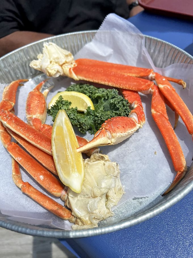 Snow crab legs arranged like nature's puzzle&mdash;the kind of dish that transforms dinner into a delightful hands-on adventure.