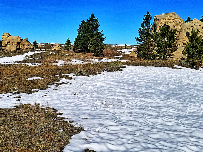 When winter blankets Medicine Rocks, the contrast between snow and stone creates a monochromatic masterpiece worth the chilly trek.