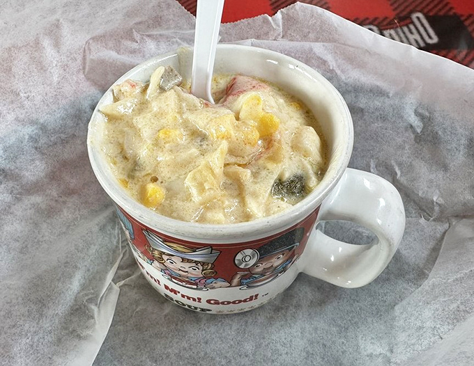 This isn't just soup&mdash;it's a warm hug in a novelty mug. Chunks of vegetables and seafood swimming in creamy comfort that makes winter worthwhile.
