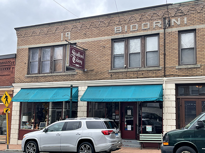 Take a stroll through historic Stafford Springs and stop by this charming brick storefront for a warm, local welcome.