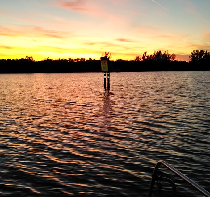 Florida's magic hour – when the setting sun transforms ordinary waters into sheets of liquid gold.