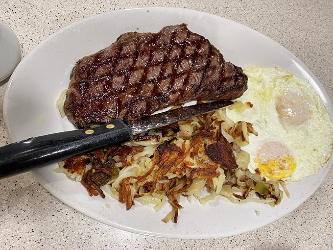 Breakfast of champions or dinner for rebels? This perfectly charred steak with eggs and hash browns doesn't care what time you think it is.