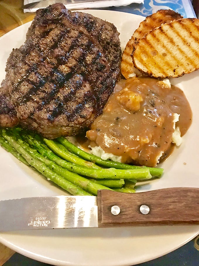 When breakfast gives way to lunch, this steak steps up to the plate with asparagus and mashed potatoes swimming in gravy. A carnivore's dream come true.