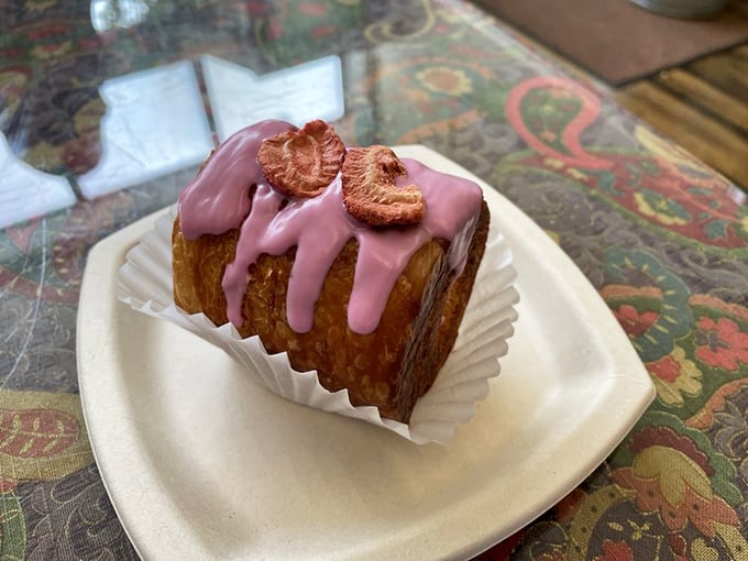 This strawberry-filled pastry glistening with sweet glaze is what breakfast dreams are made of. Your morning coffee just found its soulmate.