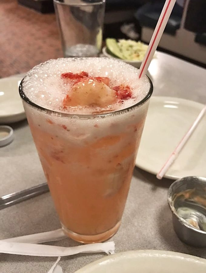When your strawberry lemonade arrives looking like a summer sunset in a glass, you know you've ordered correctly.