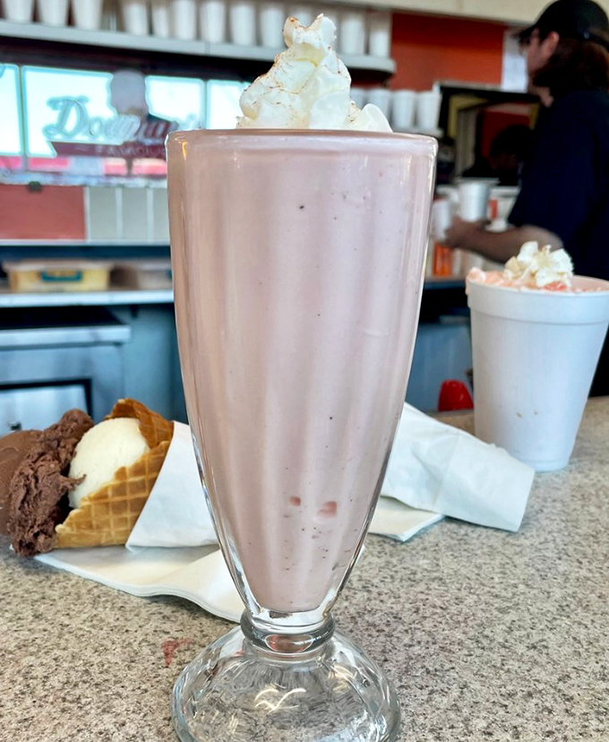 That strawberry milkshake isn't just thick—it's the kind of dense that makes physicists question their understanding of matter and straws admit defeat.