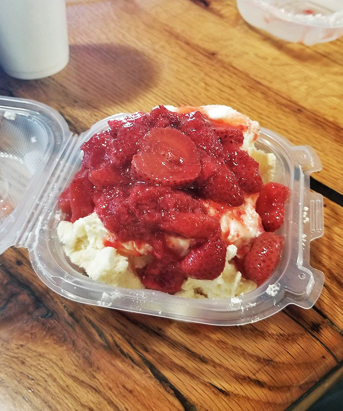 Strawberry shortcake served in a to-go container because even dessert understands you might want seconds at midnight.