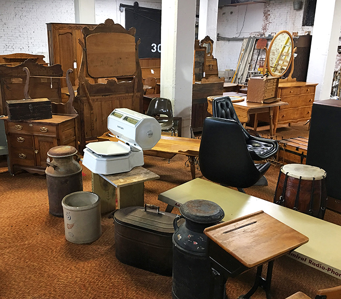 Furniture that's survived longer than most marriages, arranged in a way that makes you rethink your entire living room setup.